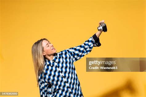 Selfie Mature Woman Color Background Photos And Premium High Res
