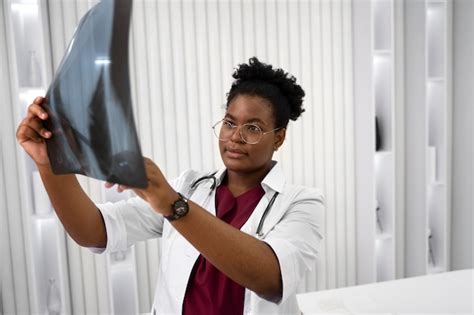 Premium Photo Medium Shot Doctor Holding Radiography