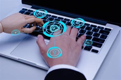 Premium Photo Businessman Hand And Robot Hands Working On A Laptop