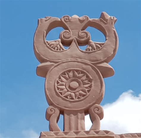 Two Buddhas And One Triratna Symbol