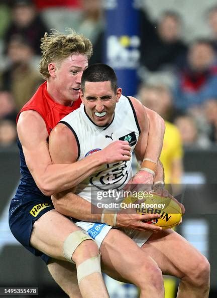 Jacob Weitering Of The Blues Is Tackled By Jacob Van Rooyen Of The News Photo Getty Images