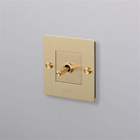 1g Retractive Toggle Switch Brass Buster Punch