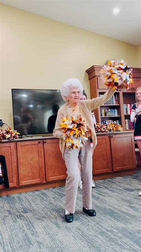 97 Year Old Woman Teaches Team Her Old Cheers