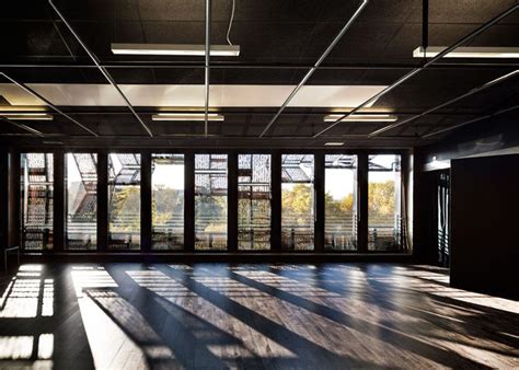 Music School In Paris Features Copper Walls And Cantilevered Studios