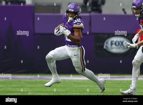 Minnesota Vikings Running Back Ty Chandler 32 Runs The Ball During