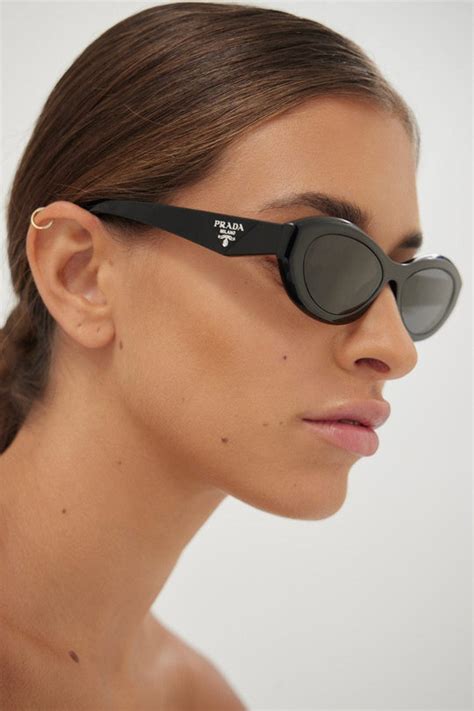 Prada Pr26zs Black Oval Sunglasses Eyewear Club