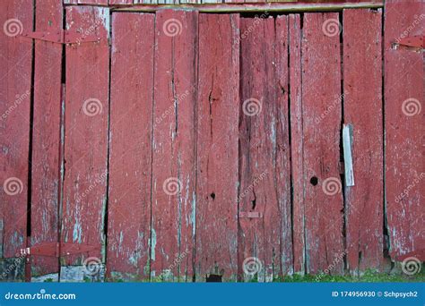 An Old Red Painted Weathered Barn With A Double Door For Background Stock Photo Image Of Field
