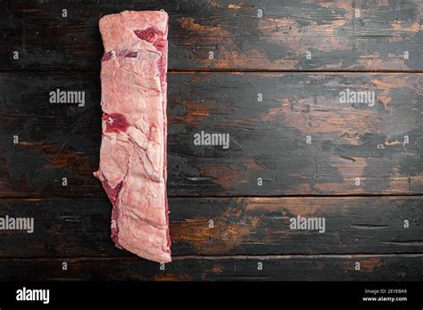Raw Organic Beef Short Ribs Ready To Cook Set On Old Dark Wooden Table