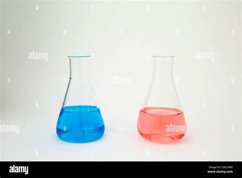 Scientific Laboratory Glass Erlenmeyer Flask Filled With Blue And Pink