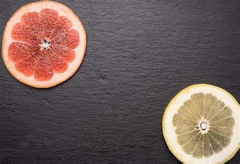 Premium Photo Citrus Fruits Cut Into Round Piece