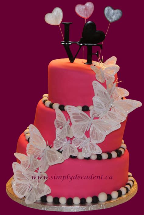 3 Tier Pink Fondant Topsy Turvy Wedding Cake With Butterflies Amp