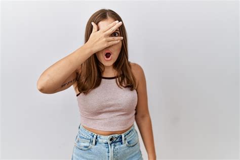 Premium Photo Young Brunette Woman Standing Over Isolated Background