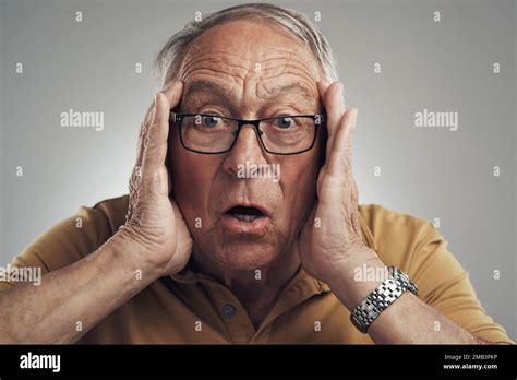 He Cant Handle The Suspense Studio Shot Of An Elderly Man Getting A
