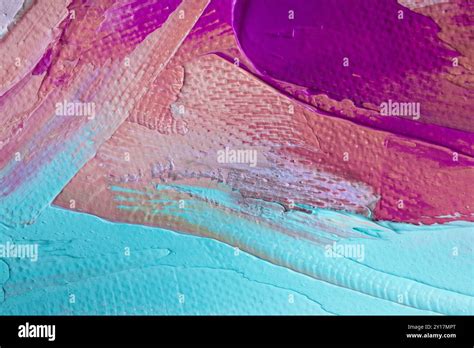 Vibrant Abstract Art Featuring Bold Colors And Textured Brush Strokes In A Creative Workspace