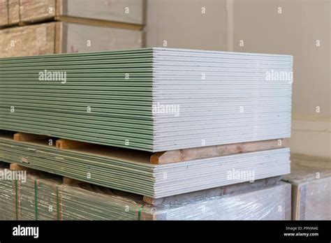 Pallet With Plasterboard In The Building Store Warehouse With Plasterboard Sheets Of