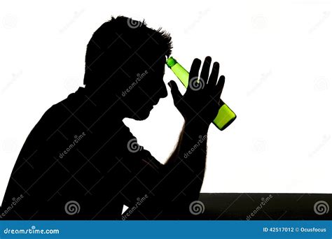 Alcoholic Drunk Man With Beer Bottle In Alcohol Addiction Silhouette
