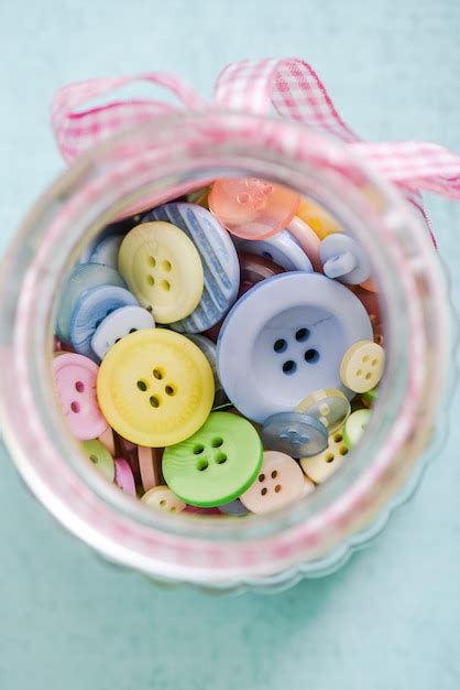 Premium Photo Colorful Buttons In Jar