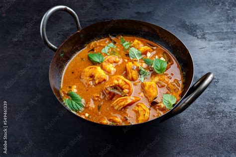 Traditional Spicy Indian Prawn Madras Curry Rogan Josh With King Prawns Served As Close Up In A