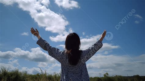 Girl Reaching Up To The Sky