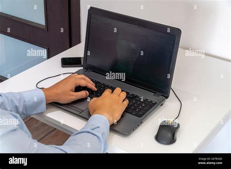 Developer Coding On A Laptop And Creating A Artificial Intelligence