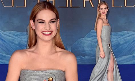 Lily James Flashes Her Legs In Silver Bandeau Gown At Uk Premiere Of