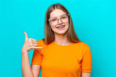 Premium Photo Teenager Russian Girl Isolated On Blue Background With