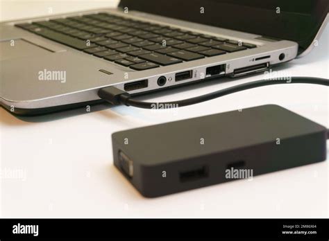 Usb C Hub Connected To Port In A Laptop Isolated On White Background