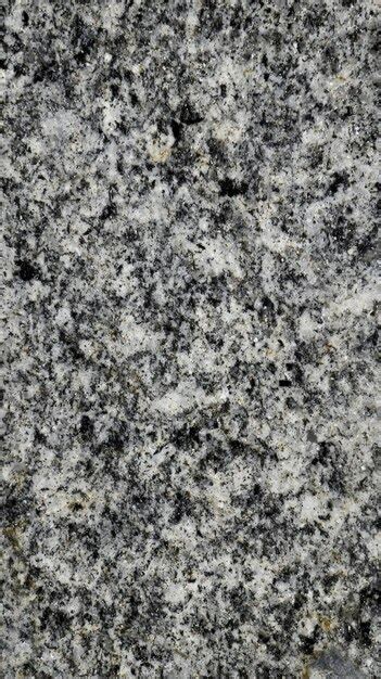 Textured Granite Surface Showcasing Intricate Patterns And Natural Beauty In Soft Light