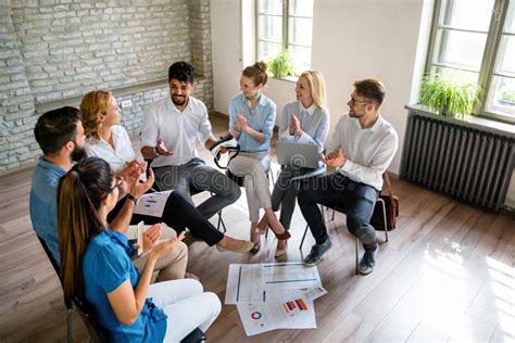 Diverse Business People In Office During Brainstorming While Discussing