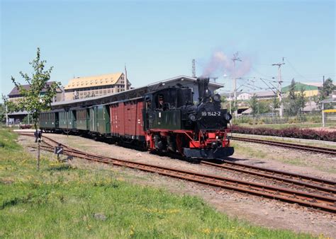 Ausfahrt von 99 1542 2 aus dem Bahnhof Mügeln in Richtung Oschatz Im