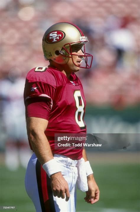 Quarterback Steve Young Of The San Francisco 49ers Looks On During A