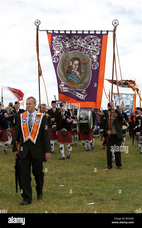 Loyal Orange Lodge Orangemen Carry Their Banner From The Field During