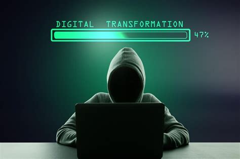 Premium Photo Hacker Using Laptop Computer At Desktop With Abstract