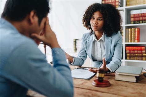 African American Attorney Lawyers Discussing Contract Or Business