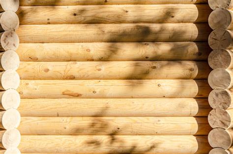 Premium Photo Texture Of Wall Of House Made Of Rounded Logs Wooden