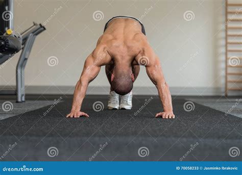 Bodybuilder Exercising Push Ups On Floor Stock Image Image Of Body