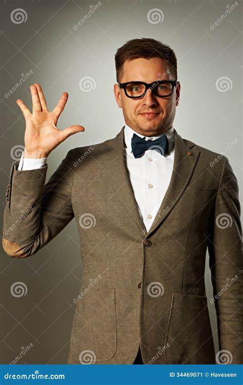 Nerd In Eyeglasses And Bow Tie Says Hello Stock Image Image Of Wear
