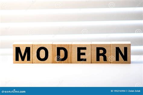Modern Word Written On Wood Block Modern Text On Cement Table For Your