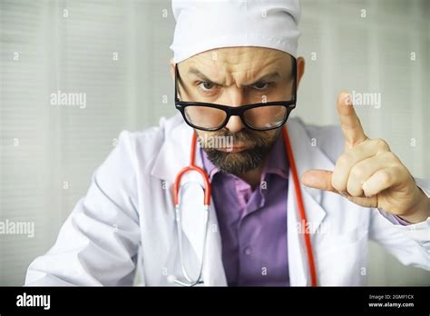 A Cross Eyed Bearded Man Is Looking Into The Frame Eye Disease The