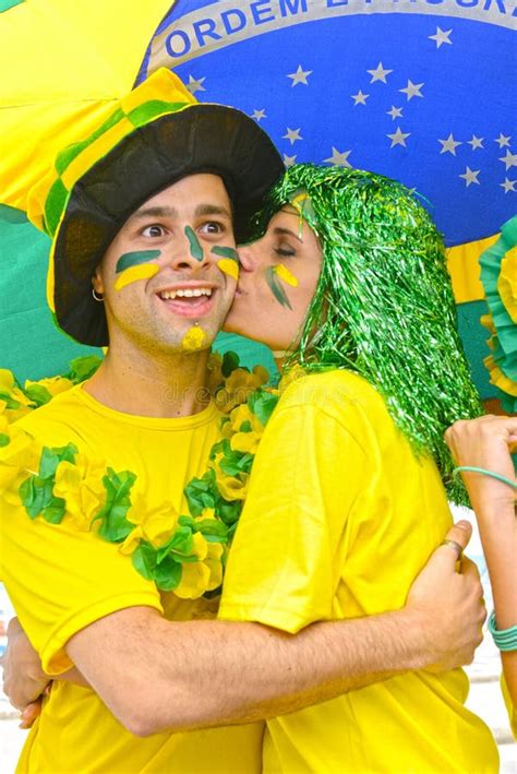 Brazilian Woman Soccer Fans Commemorating Victory Kissing Stock Image