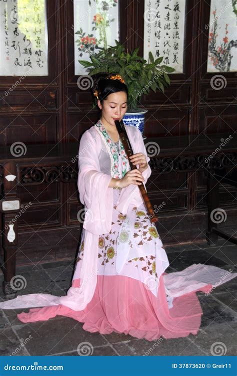 Young Woman Plays Flute In Suzhou China Editorial Image Image Of