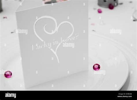 Wedding Table Display With Place Card On Bone China Plates Stock Photo