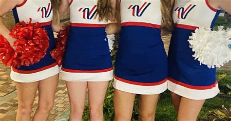 Local High School Cheerleaders Perform In Pearl Harbor Memorial Parade