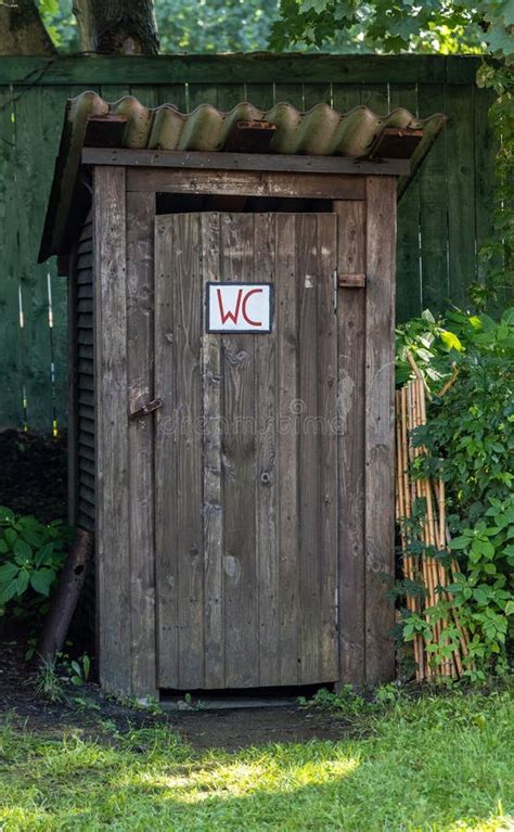 Wooden Toilet In The Forest Blue Colored Natural Bio Wc Cabin Among