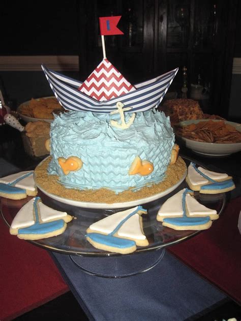 Nautical Sailboat 1st Birthday Party Smash Cake With Paper Boat Topper