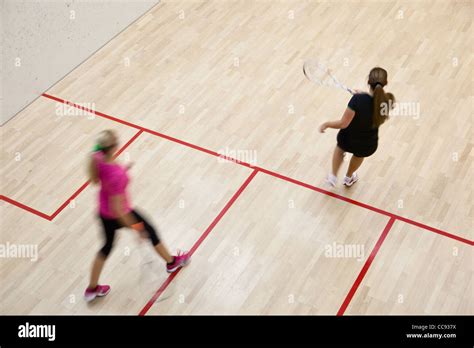 Two Female Squash Players On A Squash Court Stock Photo Alamy