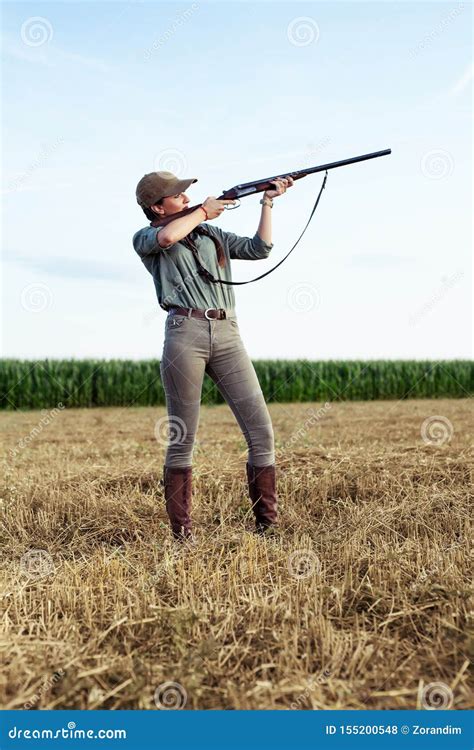 Female Hunter Aiming With Her Weapon Stock Photo Image Of Rifle Caucasian