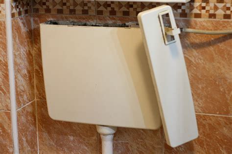 A Broken Cistern In The Bathroom That Needs To Be Replaced With Mine