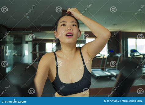 Young Beautiful And Happy Asian Korean Woman Training At Hotel Gym Or