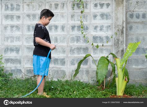 Babe Watering Tree Asian Stock Photo By Manualfoto 536470550